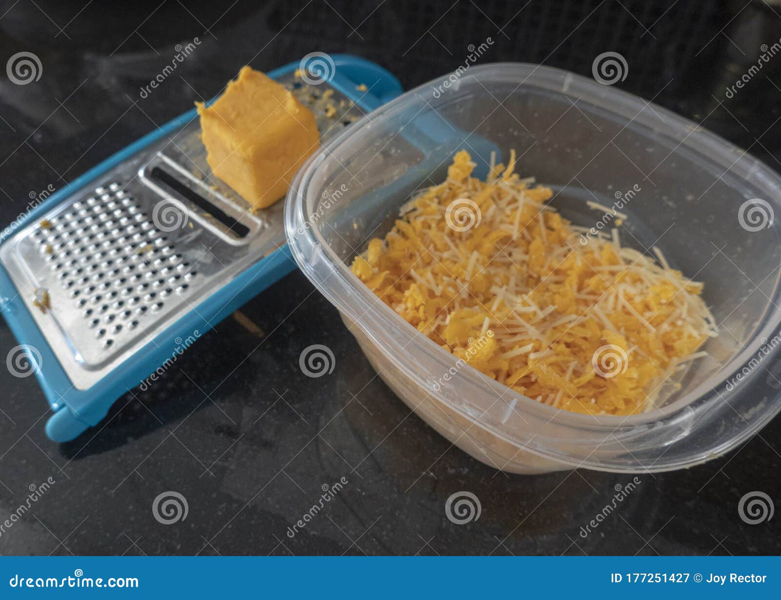 Shredded Cheese and chunk stock image. Image of shredder - 177251427