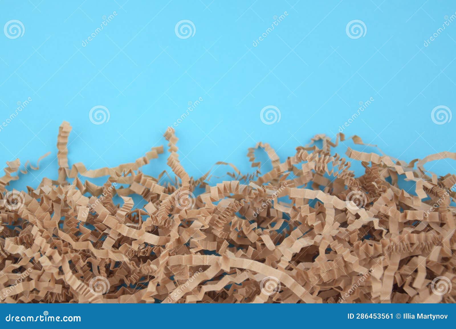 The Shredded Paper on Light Blue Background. Stock Image - Image of ...