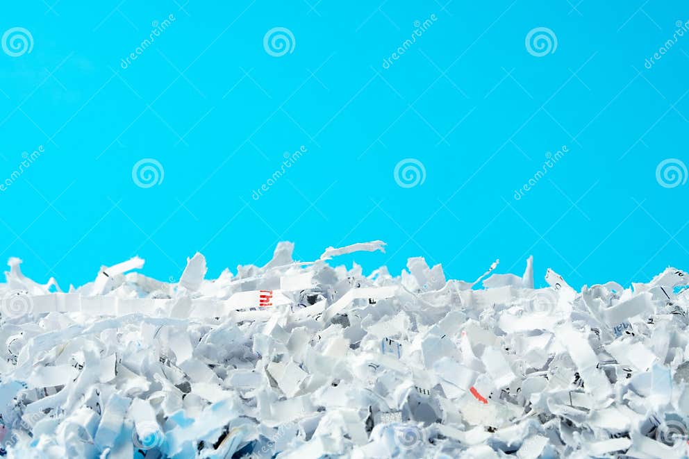 Shredded Paper Pieces on a Blue Background Stock Photo - Image of paper ...