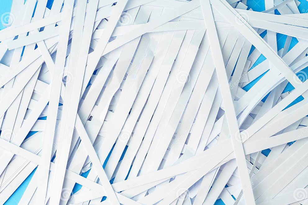 Shredded Paper Pieces on a Blue Background Stock Photo - Image of shred ...