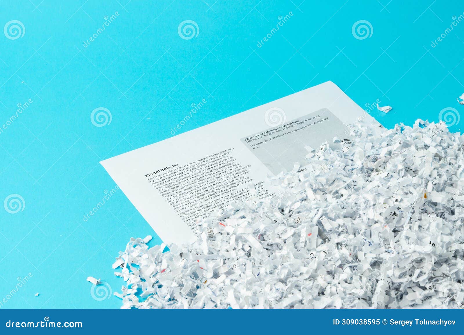 Shredded Paper Pieces on a Blue Background Stock Image - Image of ...