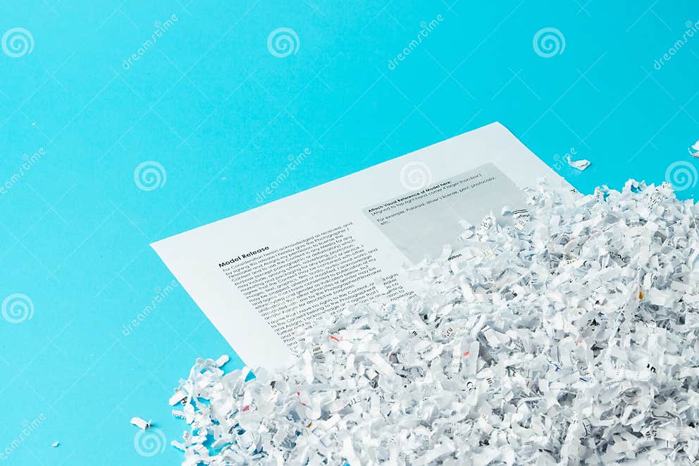 Shredded Paper Pieces on a Blue Background Stock Image - Image of ...