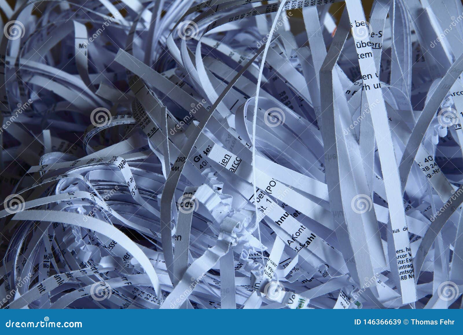 Shredded paper in a office stock image. Image of confidential - 146366639