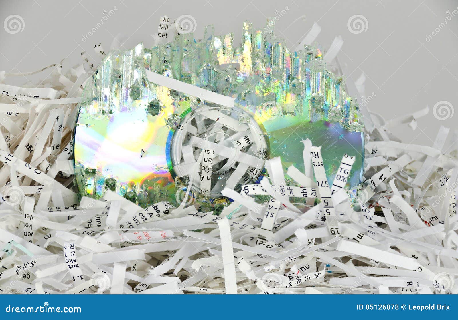 Shredded Papers and a Destroyed Data Disc Stock Photo - Image of ...