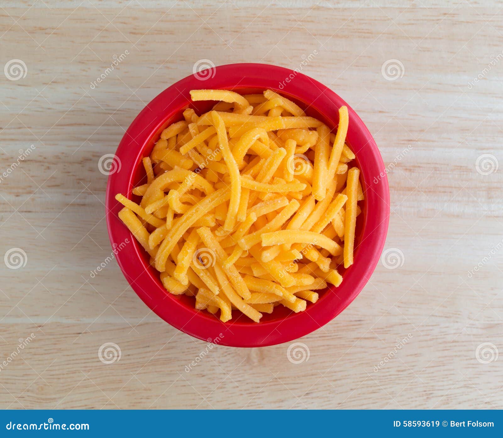 Shredded Sharp Cheddar Cheese in Red Bowl Stock Image - Image of light ...