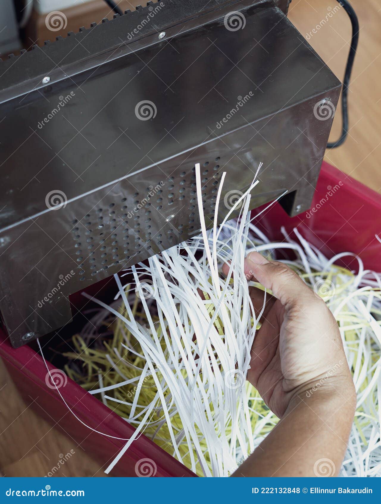 Shredding Paper Coming Out from the Machine with Hand Pulling Stock ...
