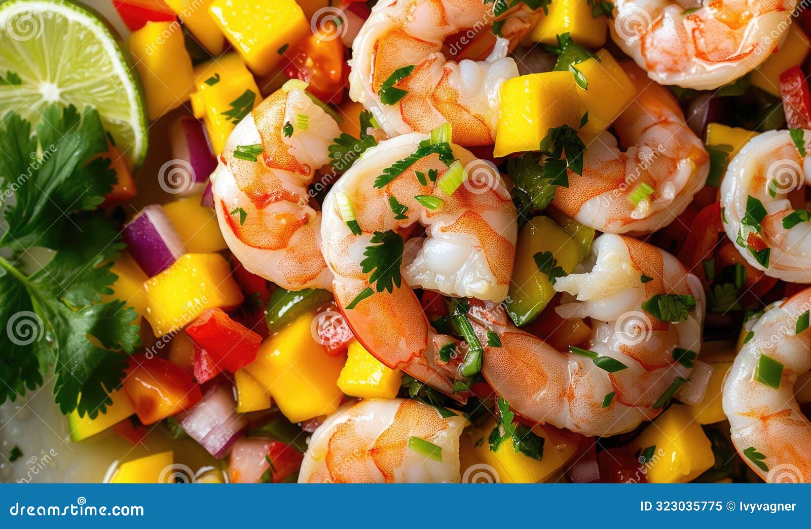 Shrimp and Mango Salsa with Lime on a Light Green Background Stock ...