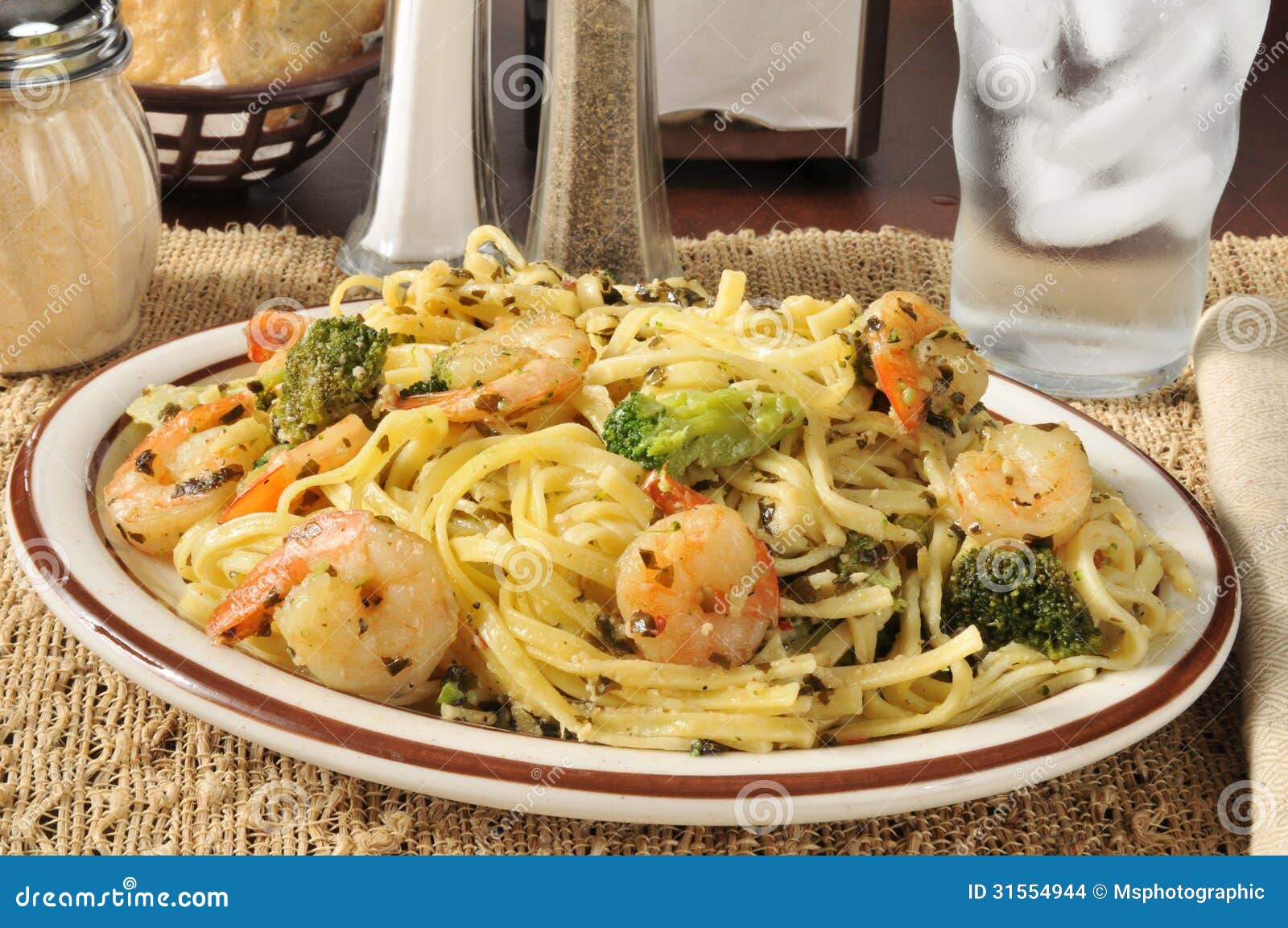 Shrimp Scampi with Broccoli Stock Photo - Image of closeup, condiments ...