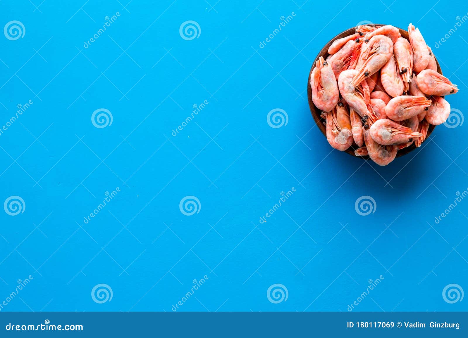 Shrimps in Shell in Bowl on Blue Desk Top-down Copy Space Stock Image ...