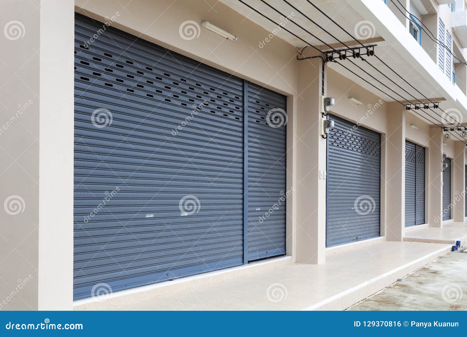 Shutter Door or Roller Door and Concrete Floor of Commercial Building ...