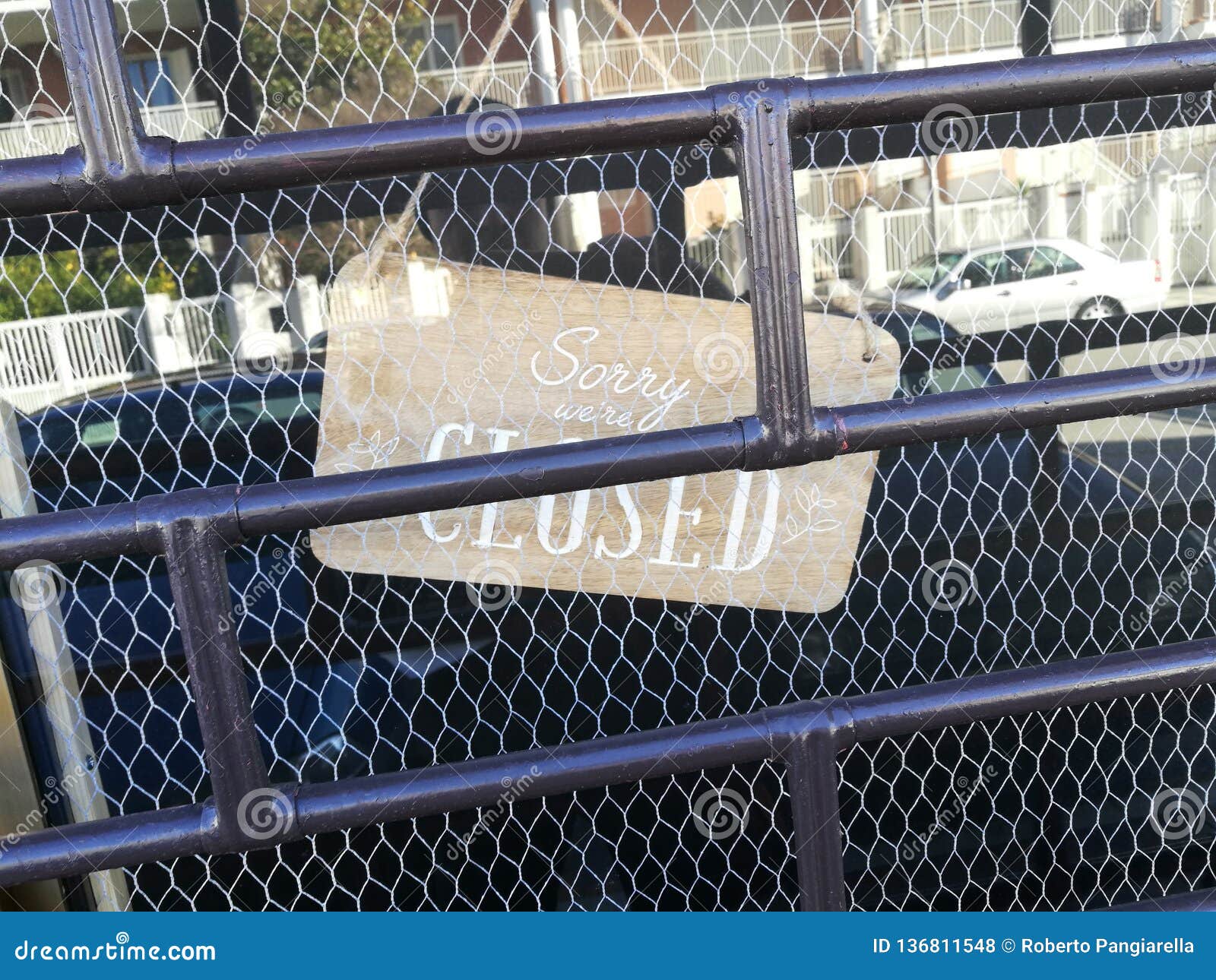 Shutter Down with Sign we are Closed Stock Photo - Image of background ...