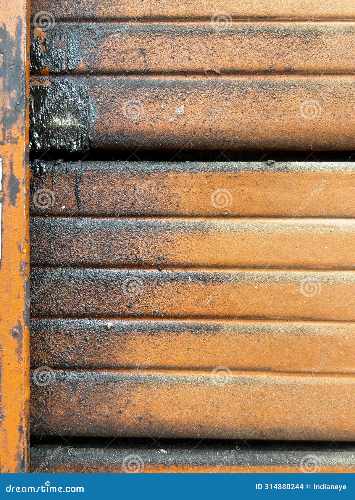 A Shutter with a Portion Having Grease, and the Surrounding Area is ...