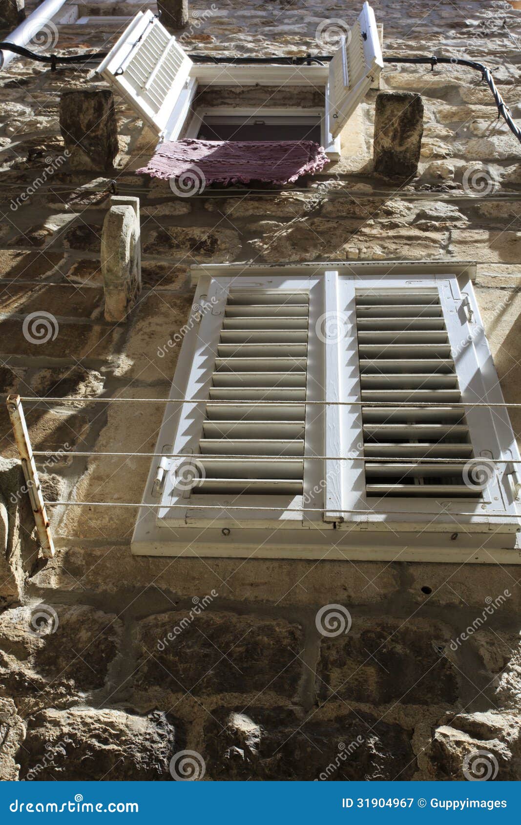 Shutters and washing stock image. Image of alley, shutter - 31904967