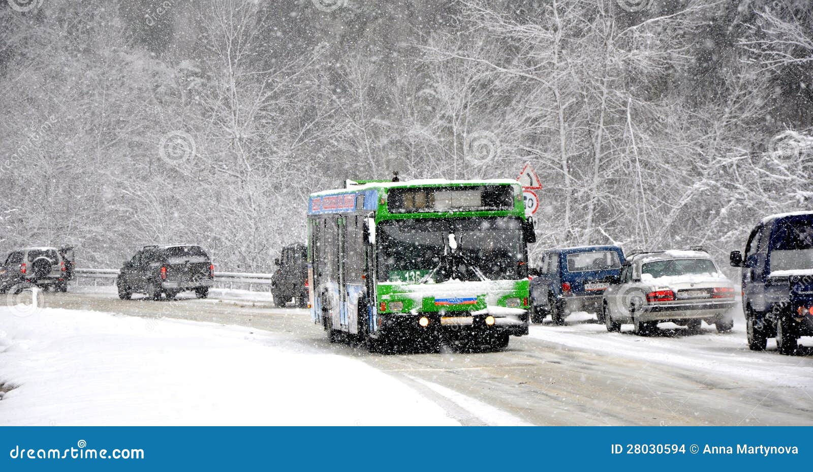 Shuttle Bus on the Road in the Snow Editorial Stock Image - Image of ...