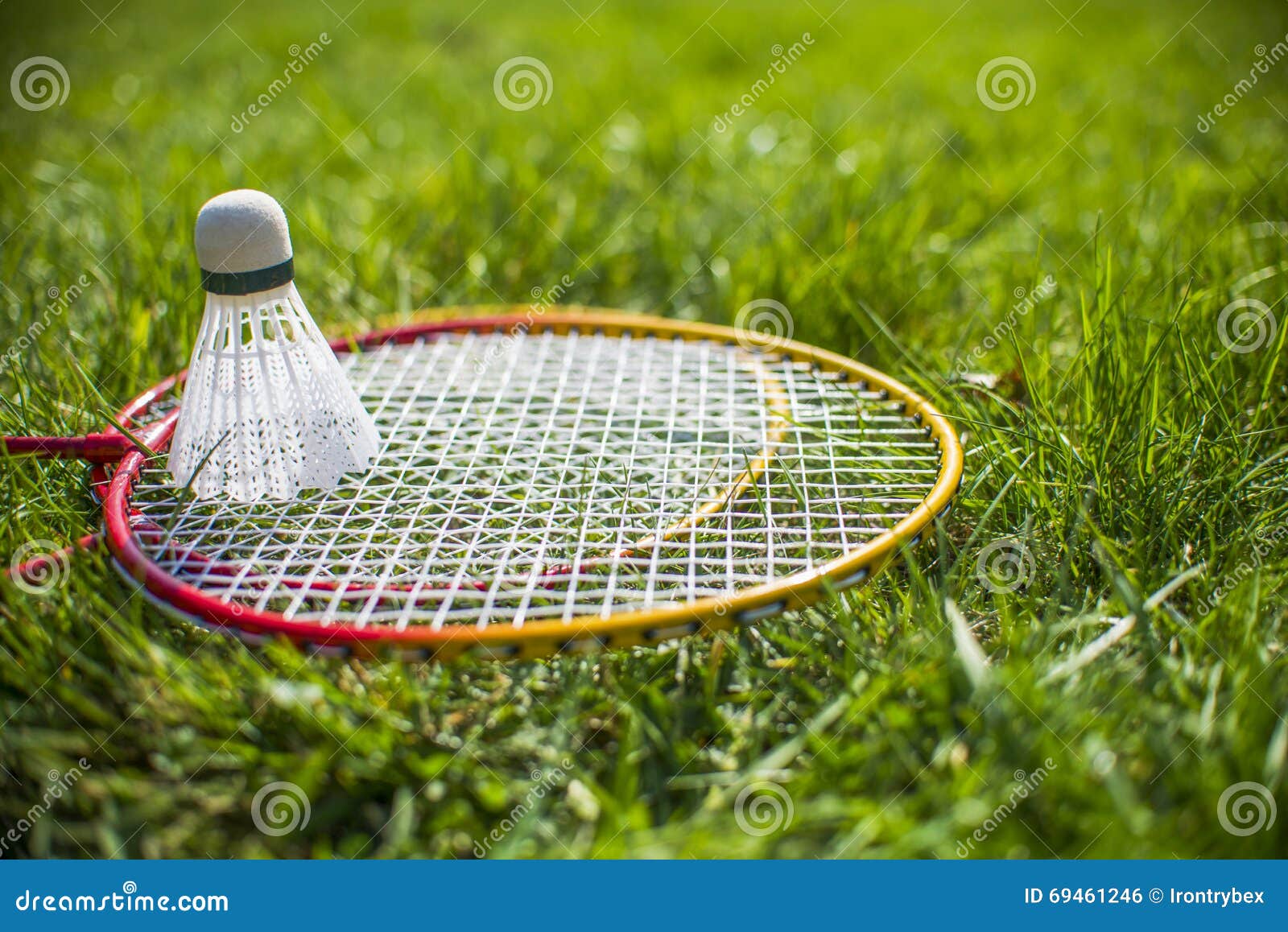 Shuttlecock and Badminton Racket on Grass Stock Photo - Image of ...