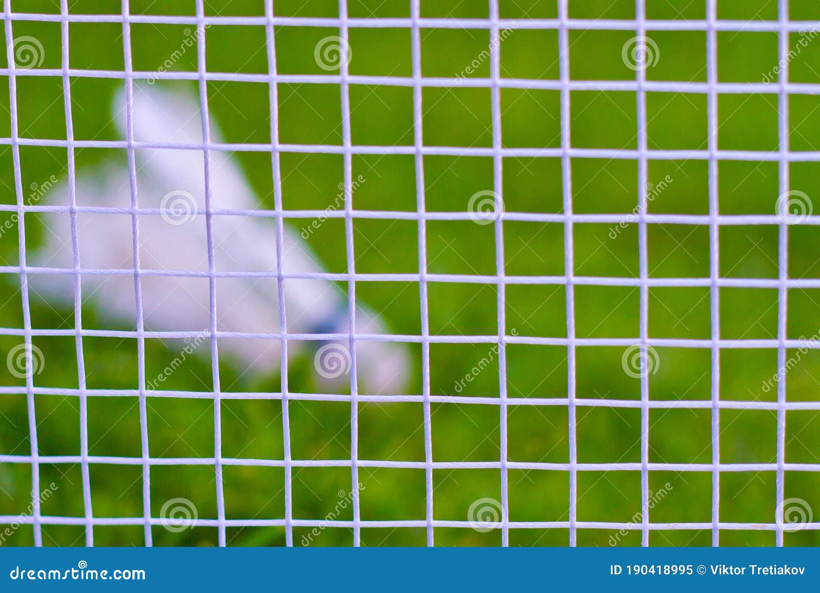 Shuttlecock on green grass stock image. Image of badminton - 190418995
