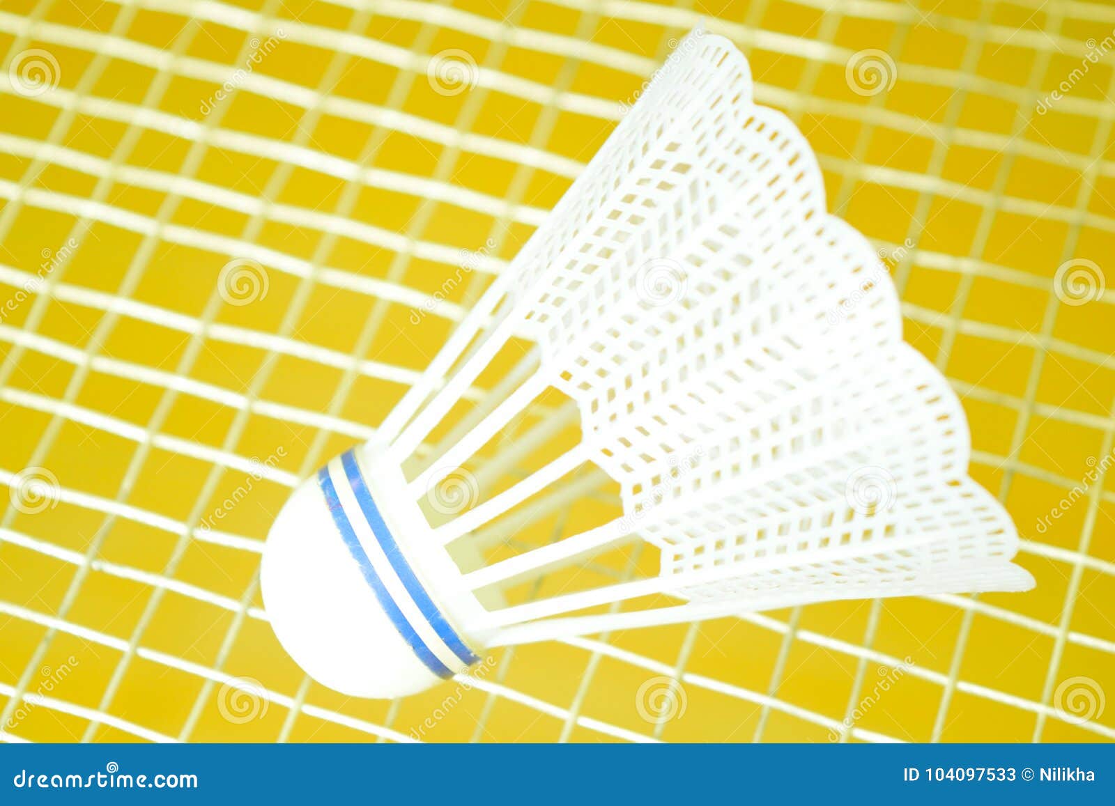 Shuttlecock on racket stock image. Image of pastime - 104097533