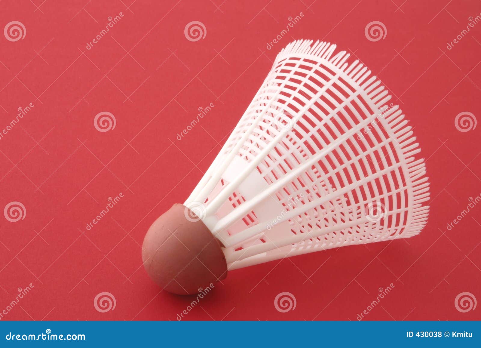 Shuttlecock on red stock photo. Image of gadget, device - 430038