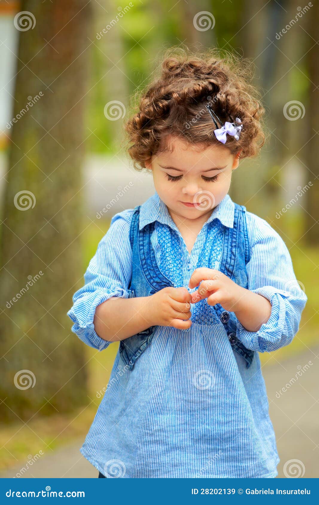 Shy little girl stock image. Image of springtime, outside - 28202139