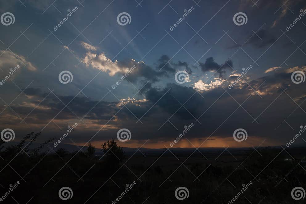 Shy sunset rays. stock photo. Image of fighting, emperors - 144210262