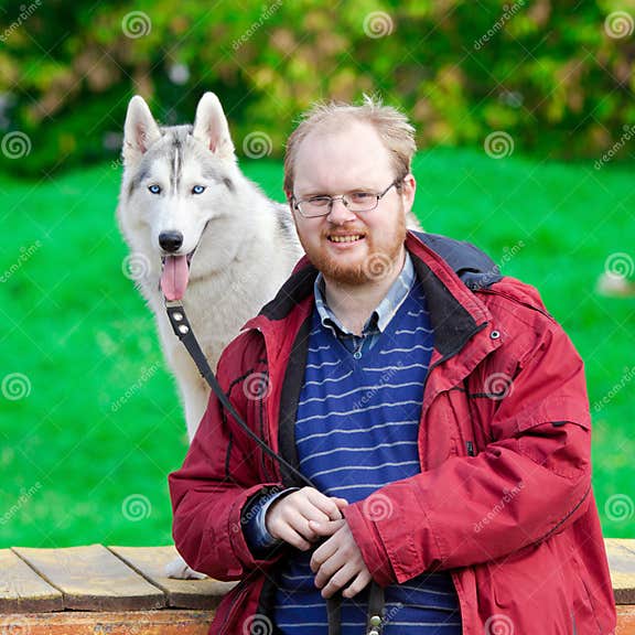 Siberian Husky with a man stock image. Image of person - 16617725