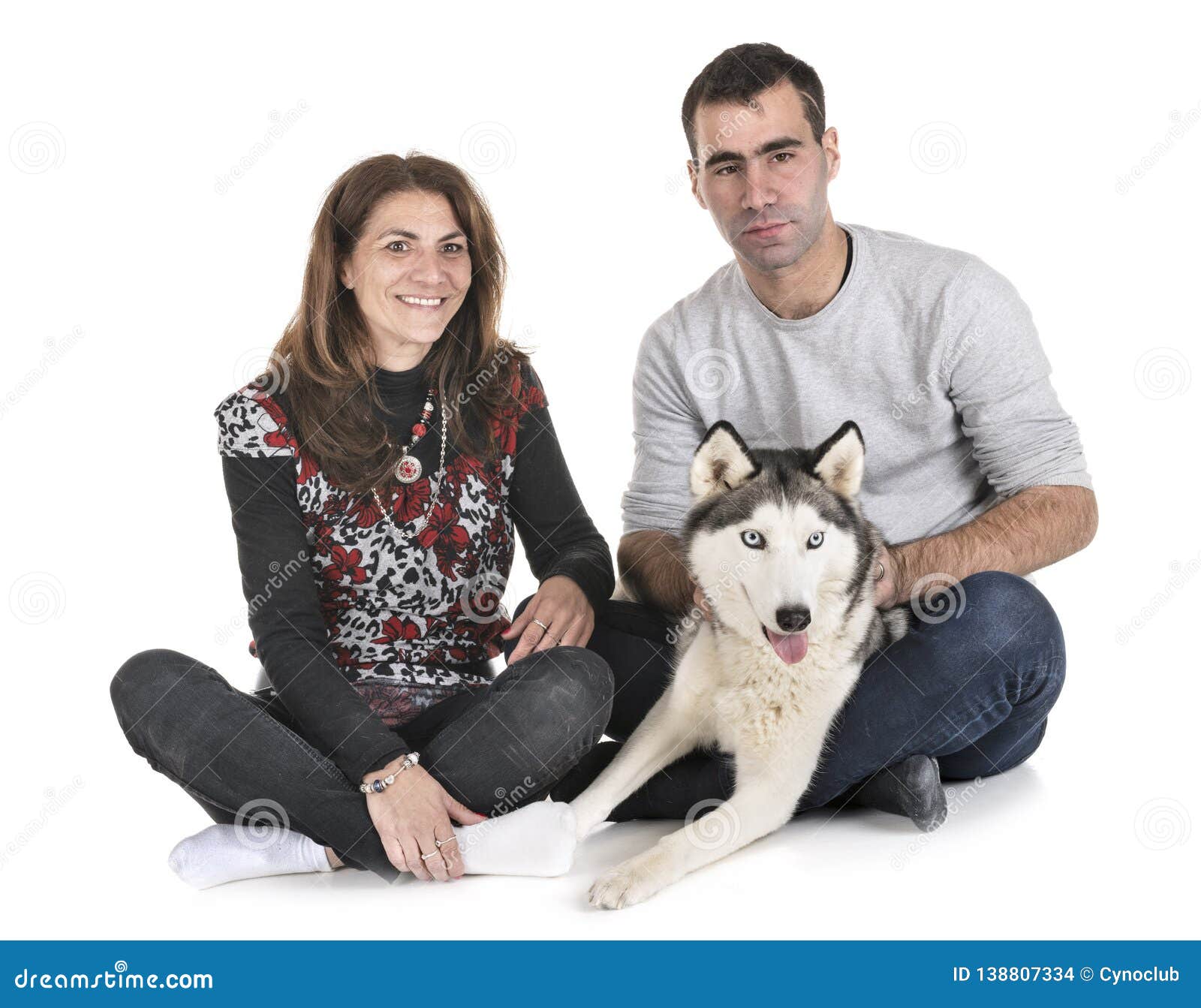 Siberian husky and owners stock photo. Image of animal - 138807334