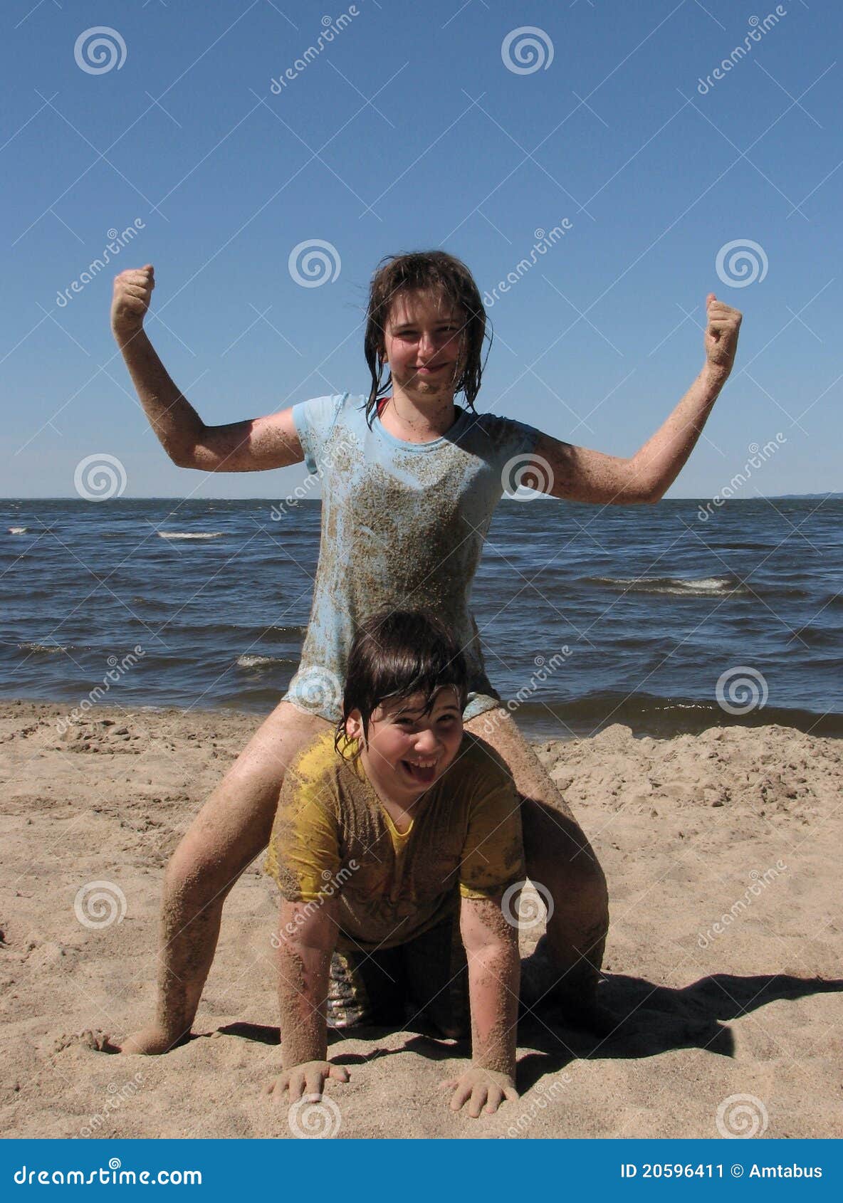 Siblings beach sandy fun stock image. Image of freedom - 20596411