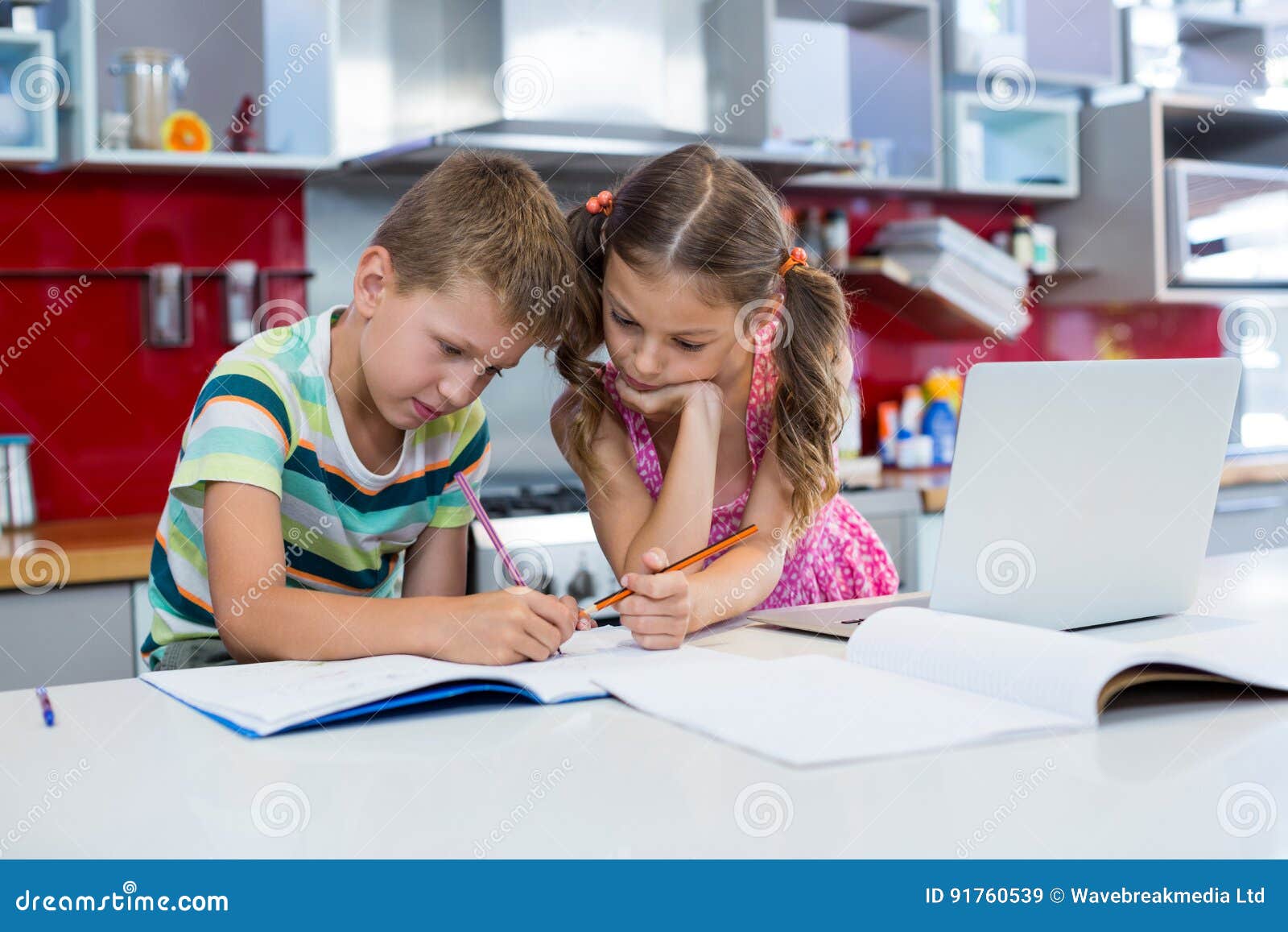 Siblings Doing Homework in Kitchen Stock Image - Image of book, guiding ...