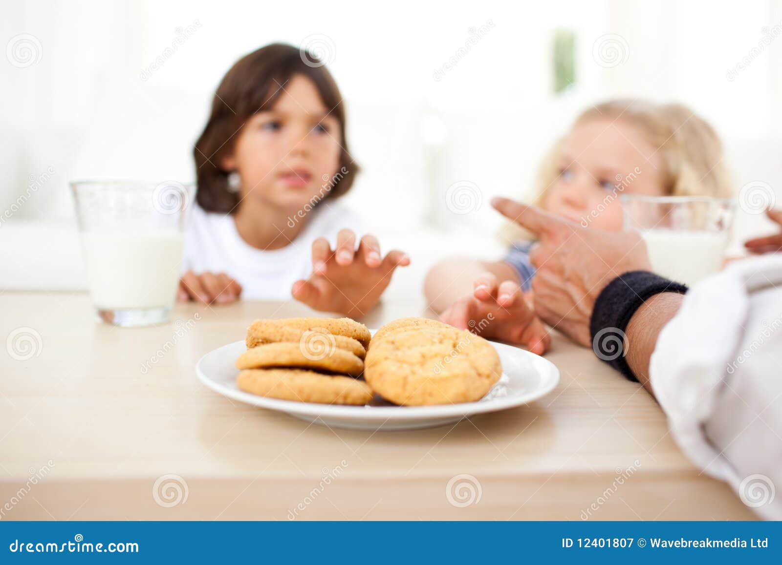Siblings Eating Biscuits and Drinking Milk Stock Image - Image of ...