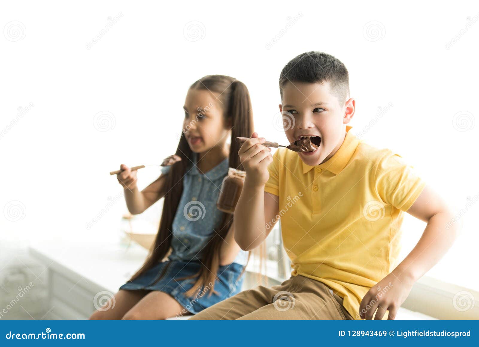 Siblings Eating Chocolate Together Stock Image - Image of kids, home ...