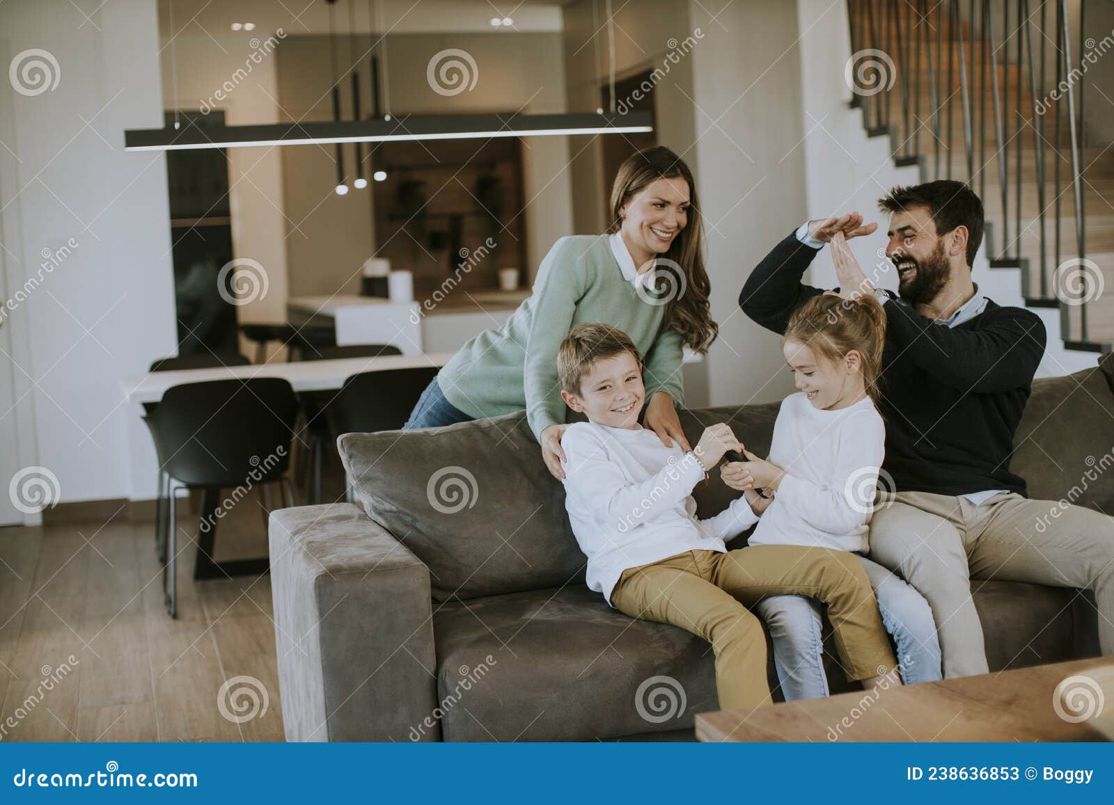 Siblings Fighting Over TV Remote Control at Home Stock Image - Image of ...
