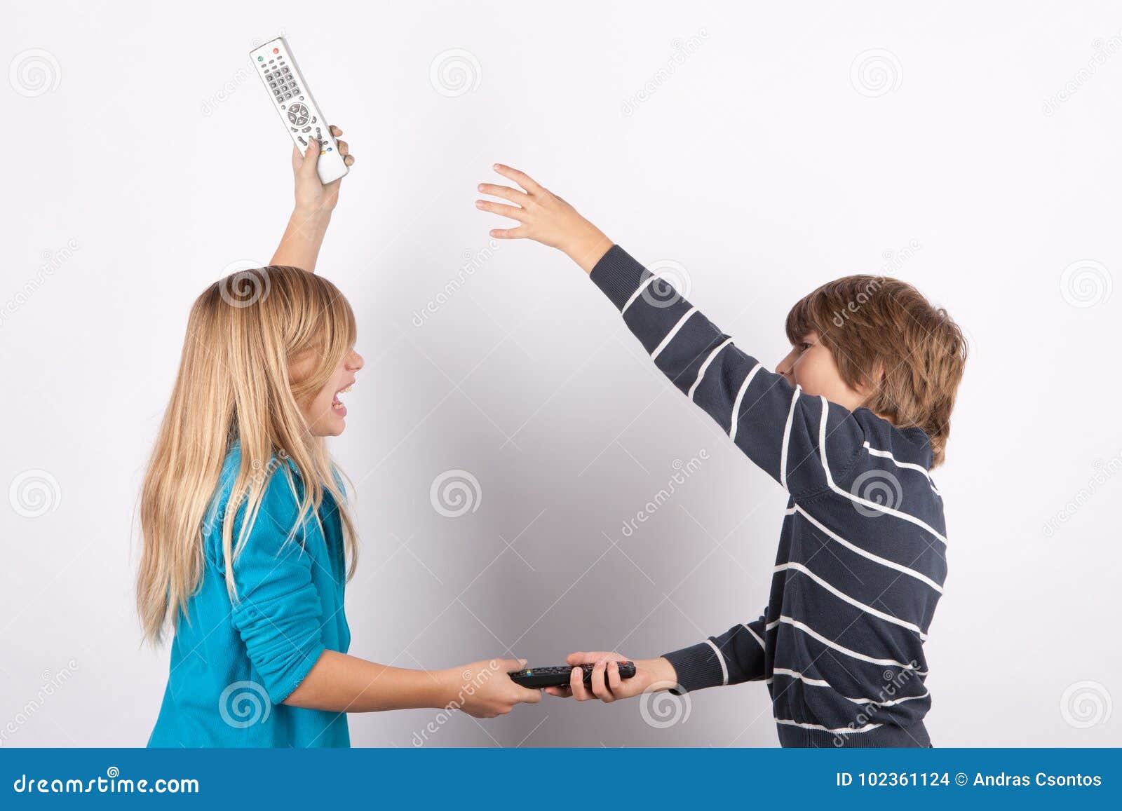 Siblings Fighting for TV Remote Controls Stock Photo - Image of remote ...