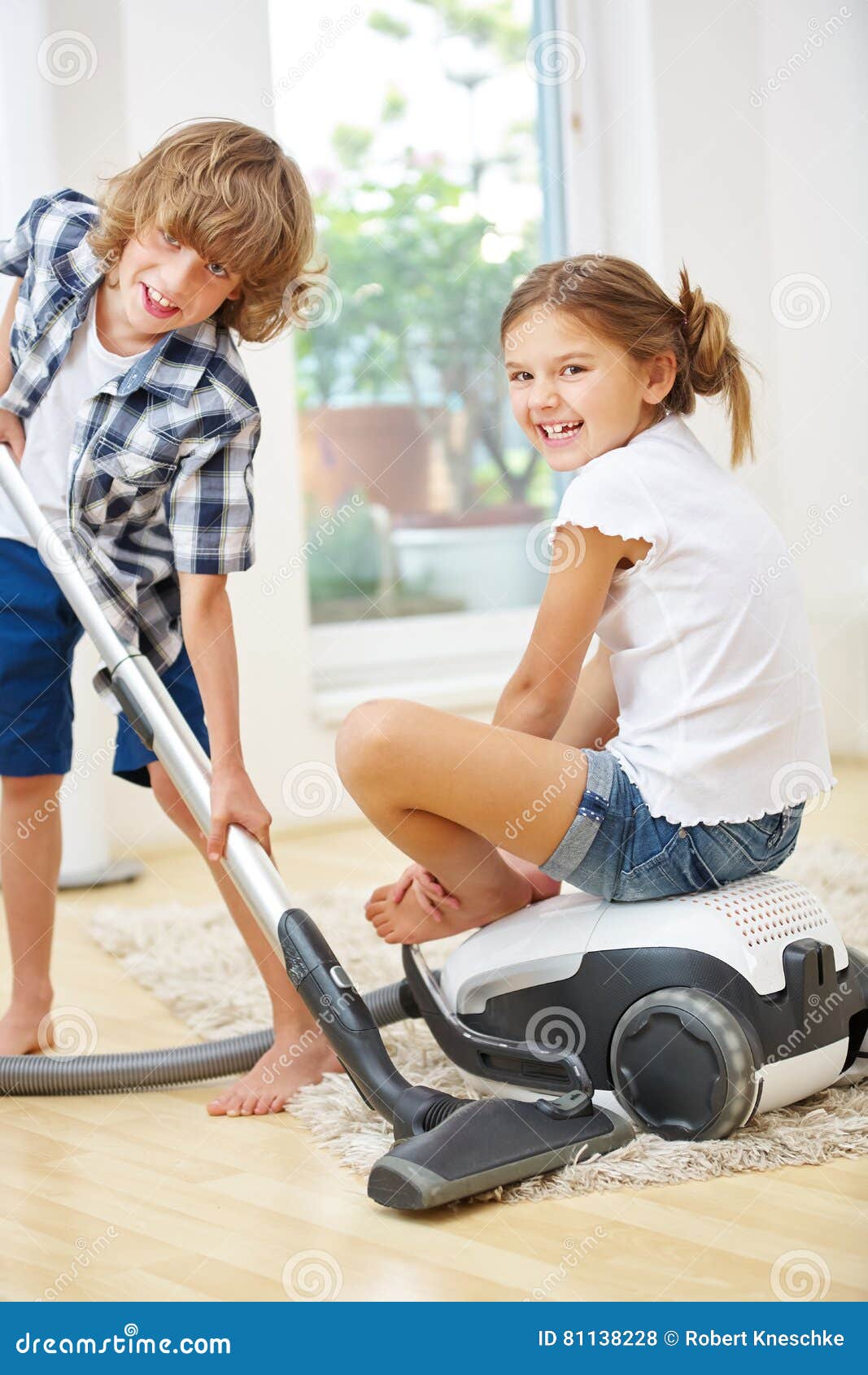 Siblings Having Fun with Vacuum Cleaner Stock Photo - Image of people ...