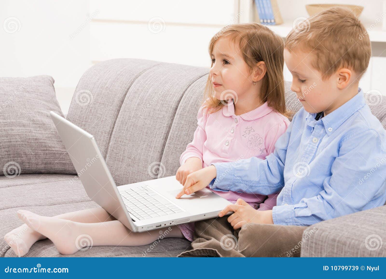 Siblings with Laptop Computer Stock Image - Image of cute, internet ...
