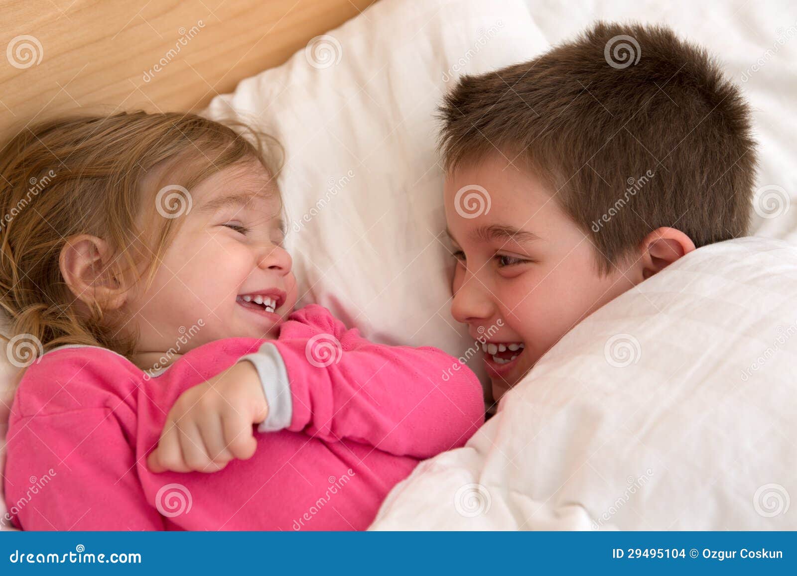 Siblings Laughing Each Other Stock Photo - Image of connection ...