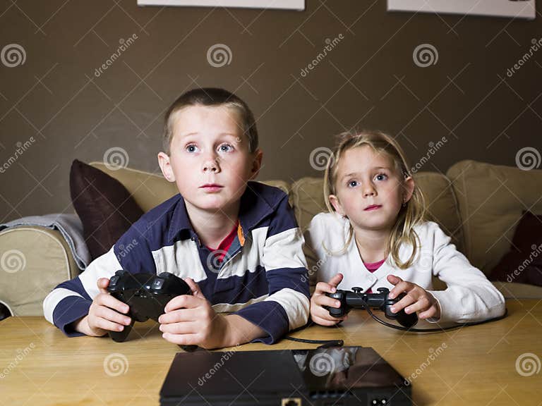 Siblings Playing Video Games Stock Photo - Image of brother, boys: 17022750