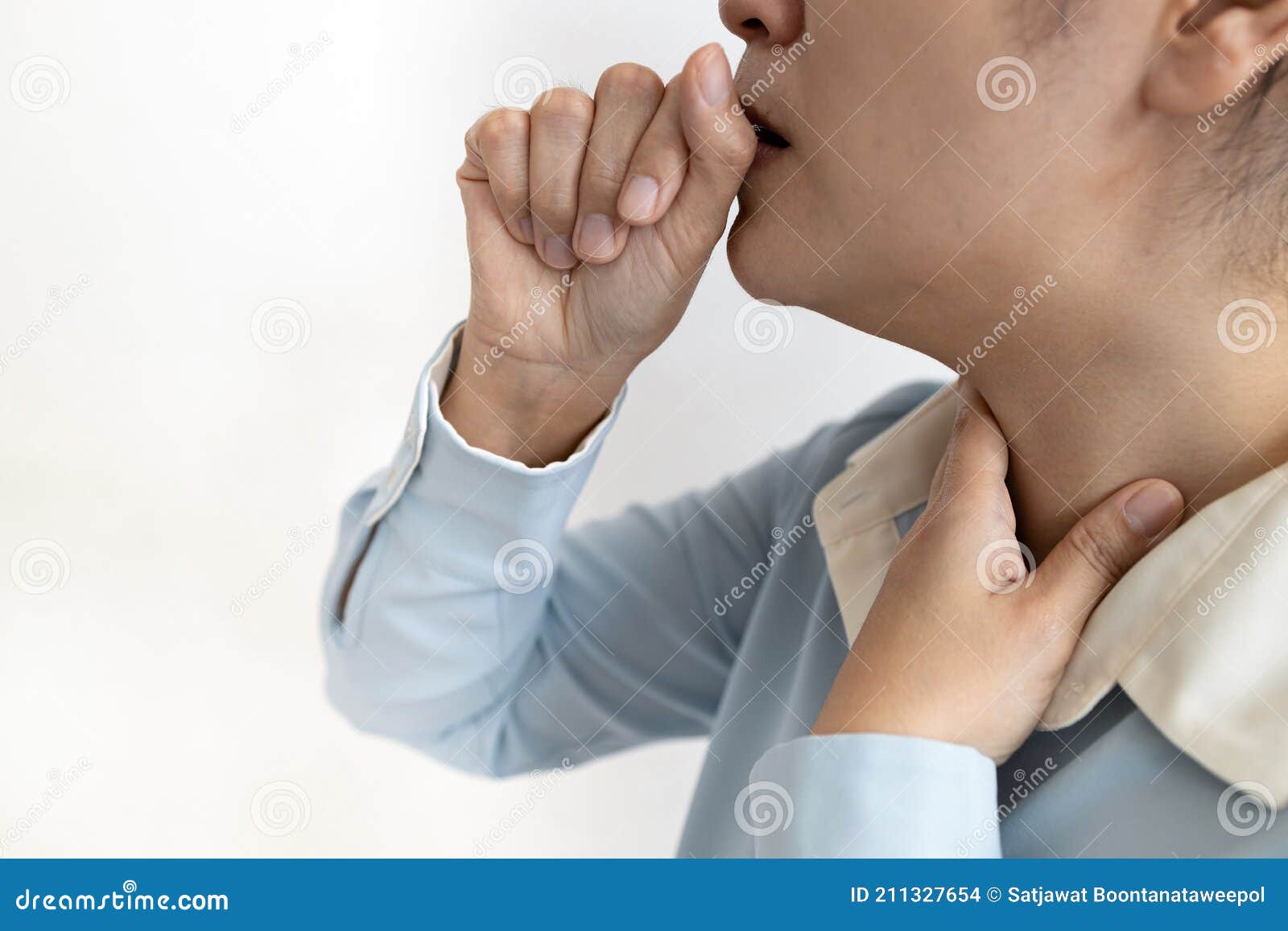 Sick Asian Woman With Coughing Into Her Fist And Puts Hand To Her
