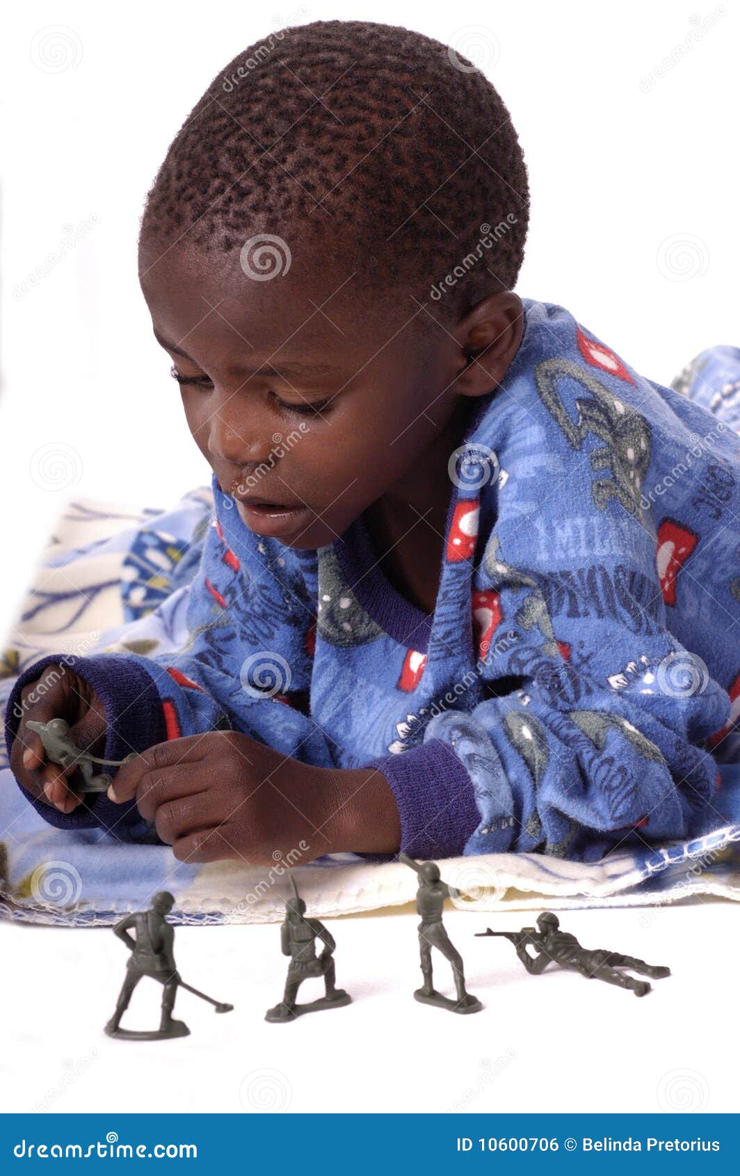 A Sick Child in Bed Playing with His Toys Stock Photo - Image of ...