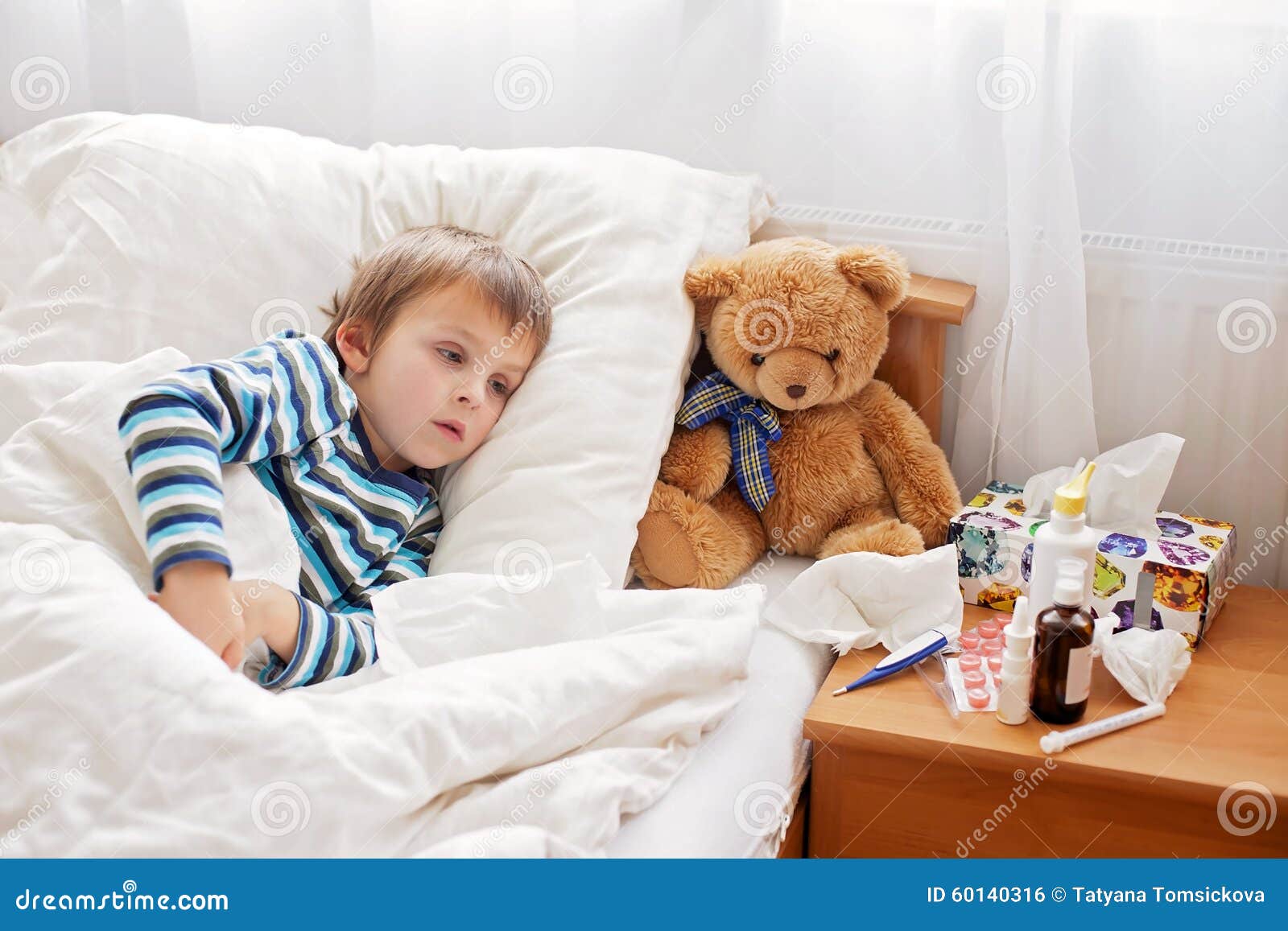 Sick Child Boy Lying in Bed with a Fever, Resting Stock Photo - Image ...