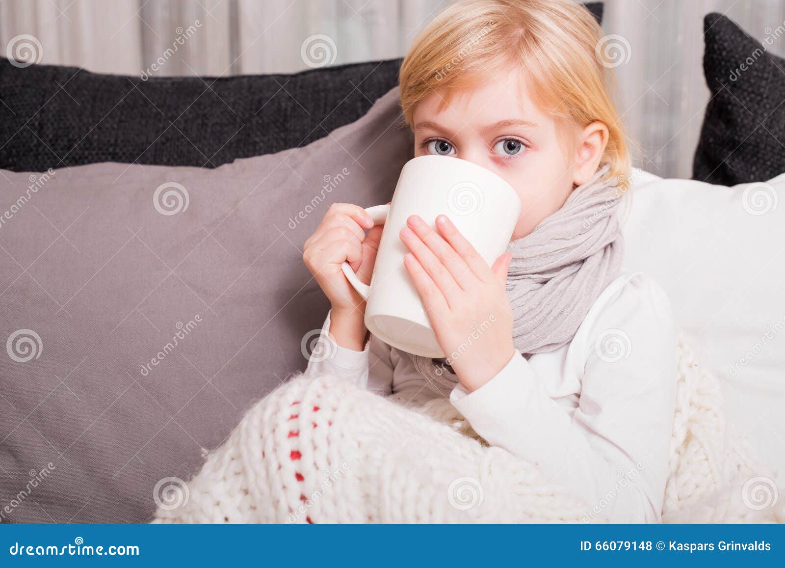 Sick child drinking tea stock photo. Image of blanket - 66079148