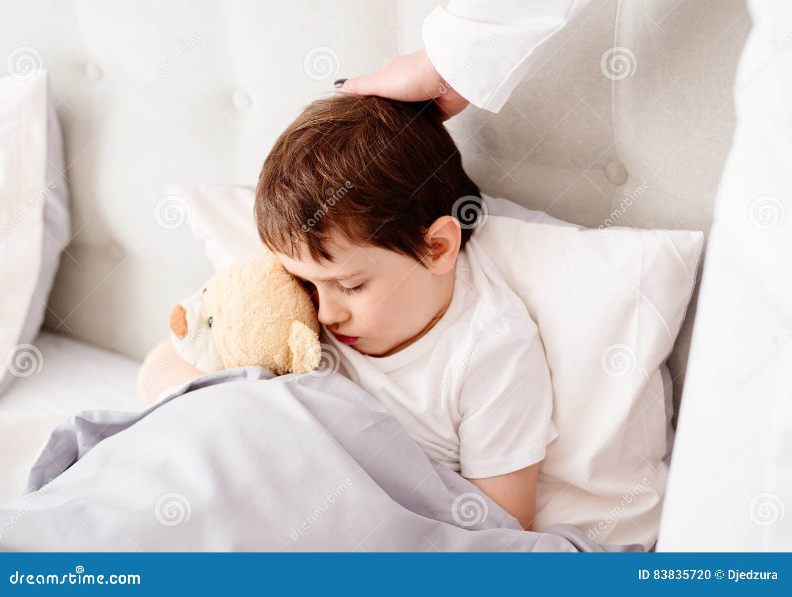 Sick Child Hugging a Teddy Bear Stock Photo - Image of home, clinic ...
