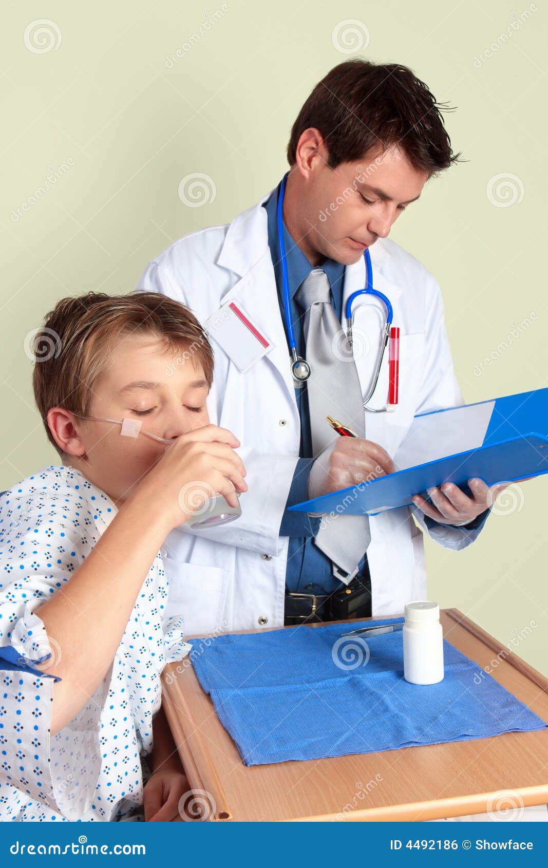 Sick child taking medicine stock photo. Image of paediatrician - 4492186