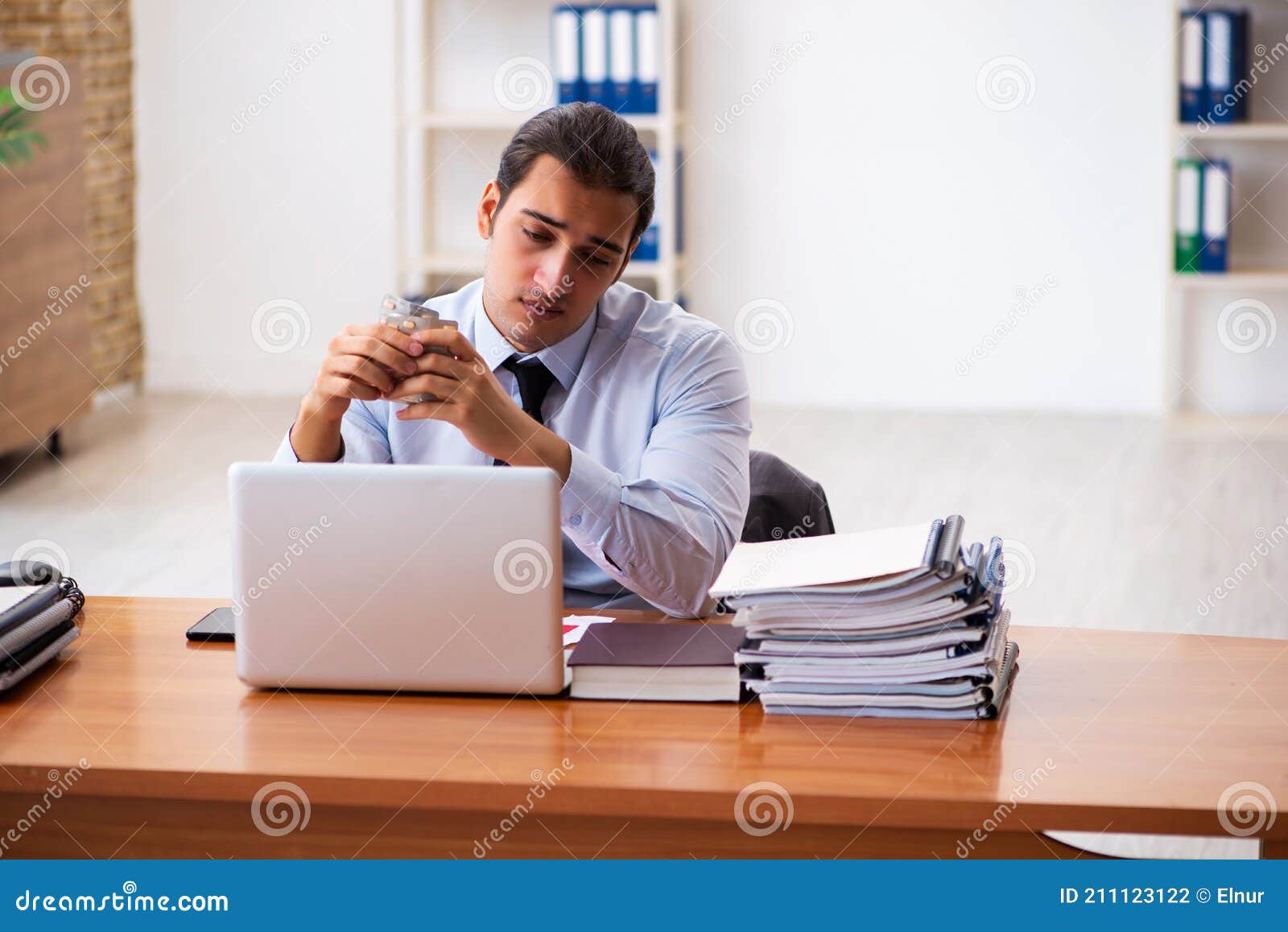 Sick Male Employee Working in the Office Stock Photo - Image of illness ...