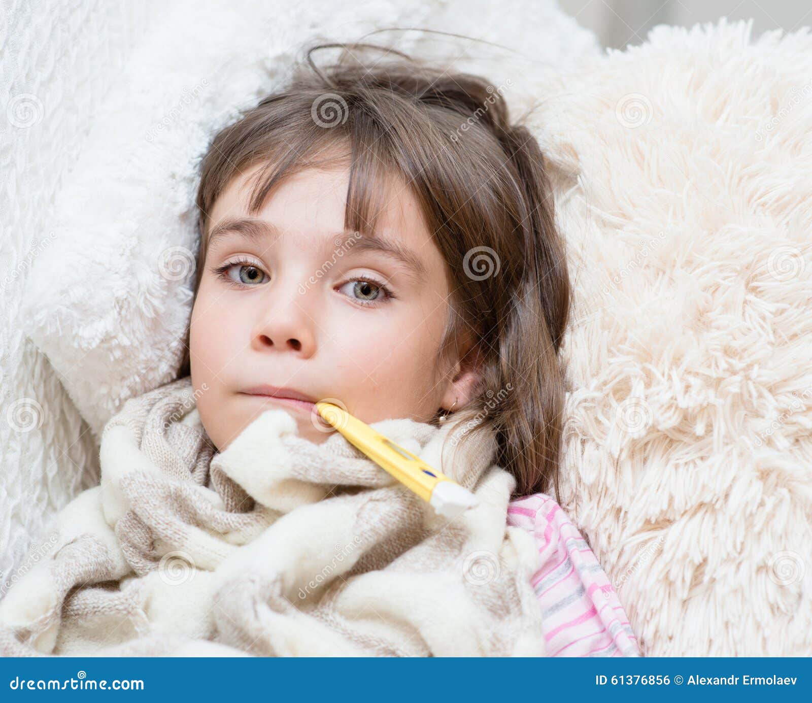 Sick Girl Lying In Bed With A Thermometer In Mouth Stock Photo ...
