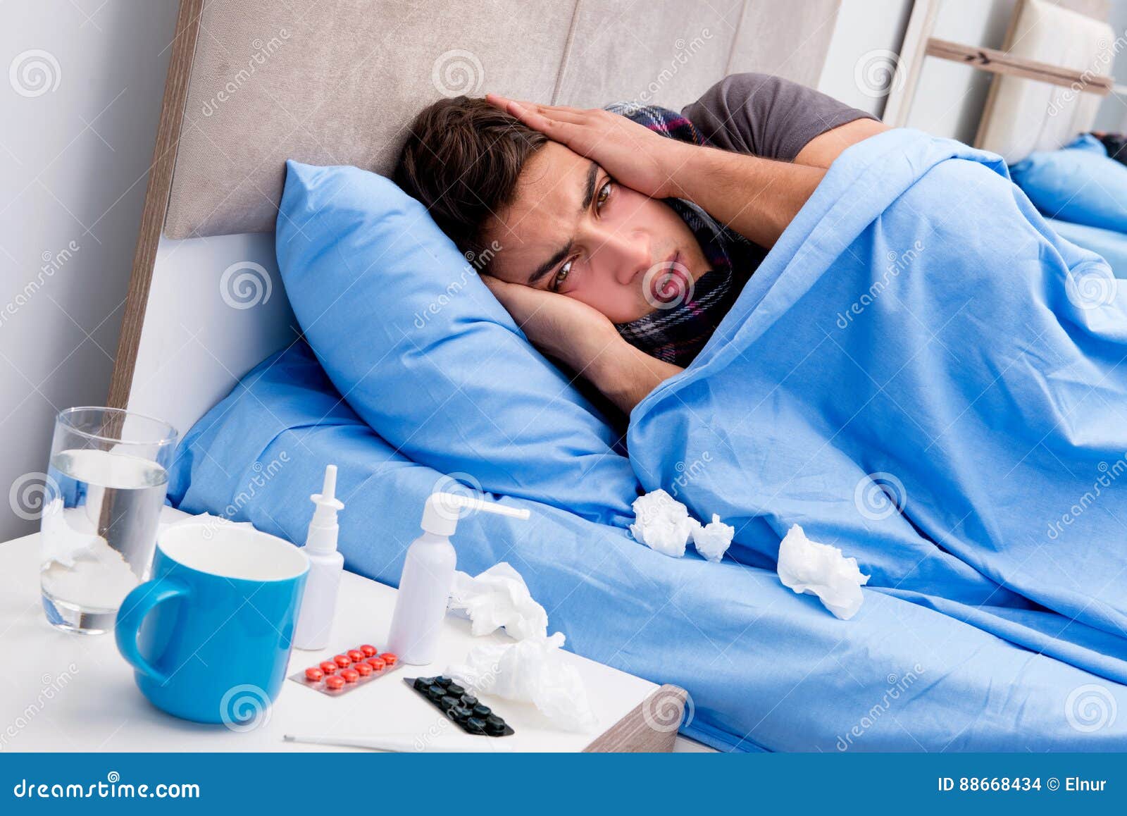The Sick Ill Man in the Bed Taking Medicines and Drugs Stock Photo ...