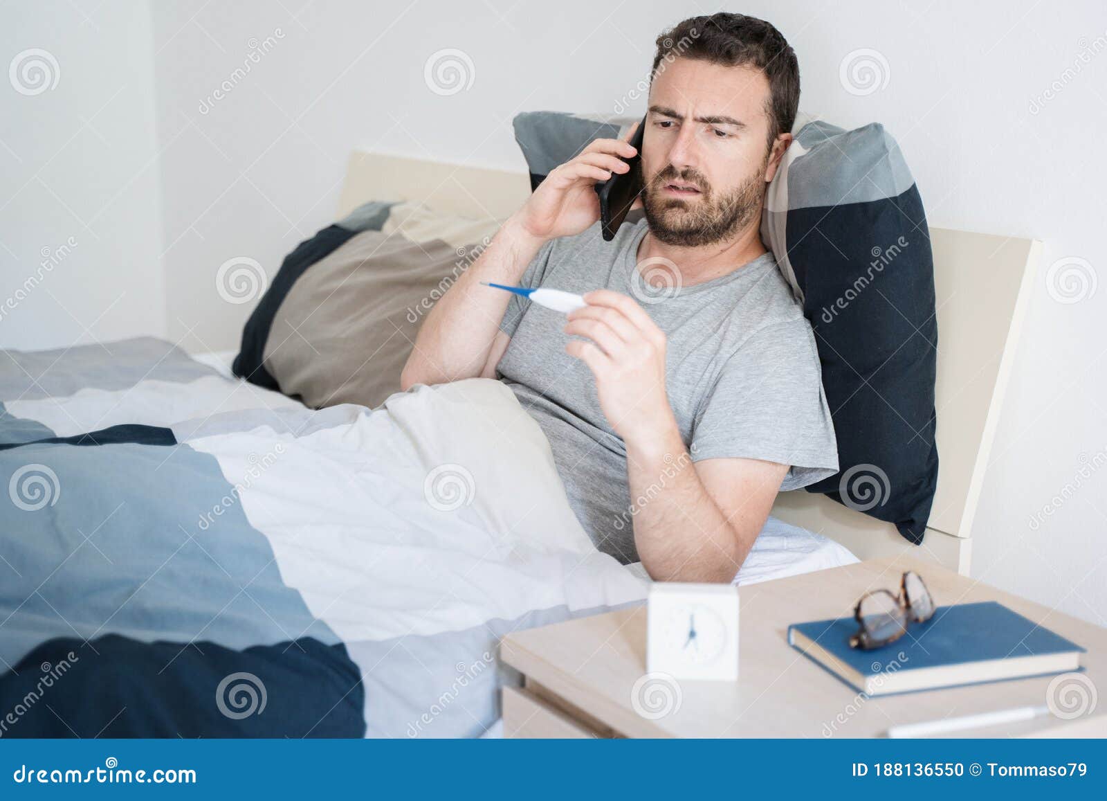 Sick Man Asking Doctor a Consultation Using Phone Stock Photo - Image ...