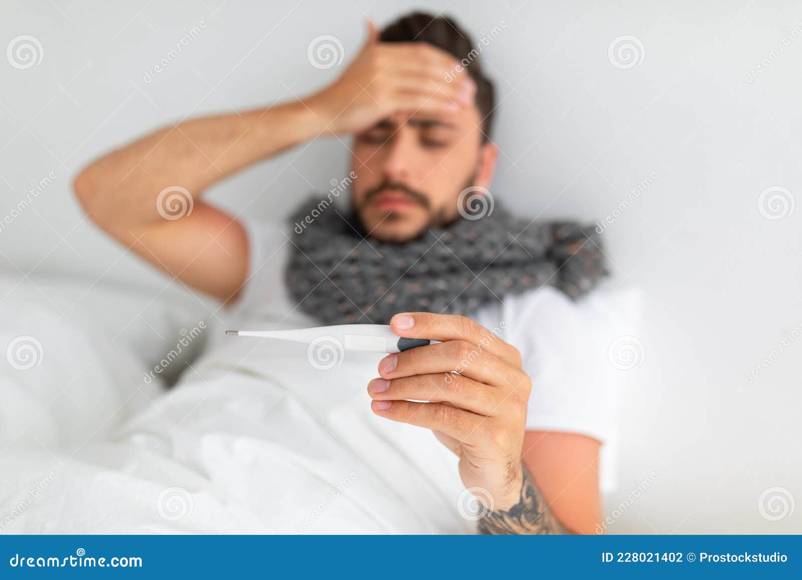 Sick Man Checking Body Temperature Holding Thermometer and Touching ...