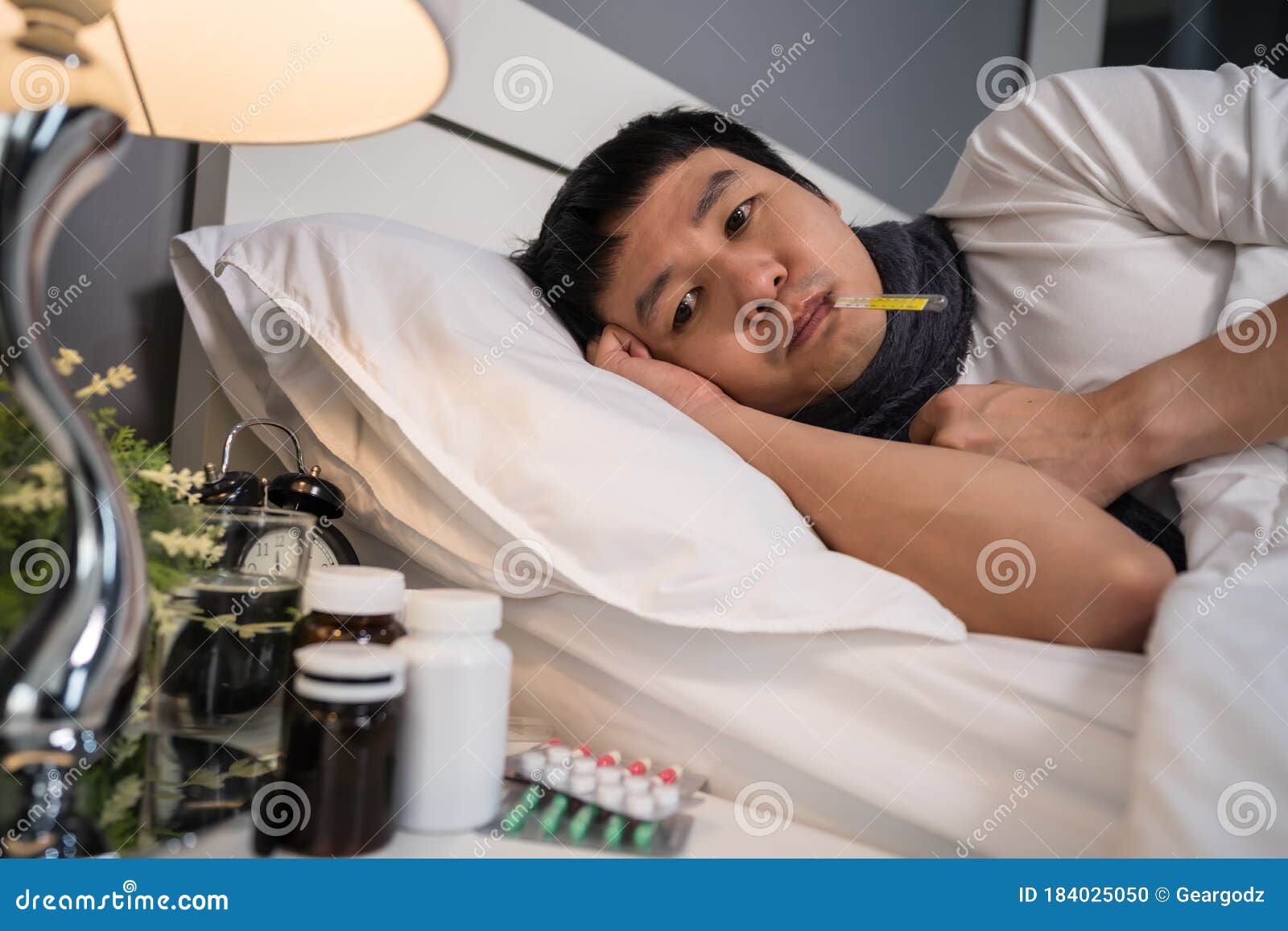 Sick Man Feeling Cold and Using Thermometer To Checking His Temperature ...