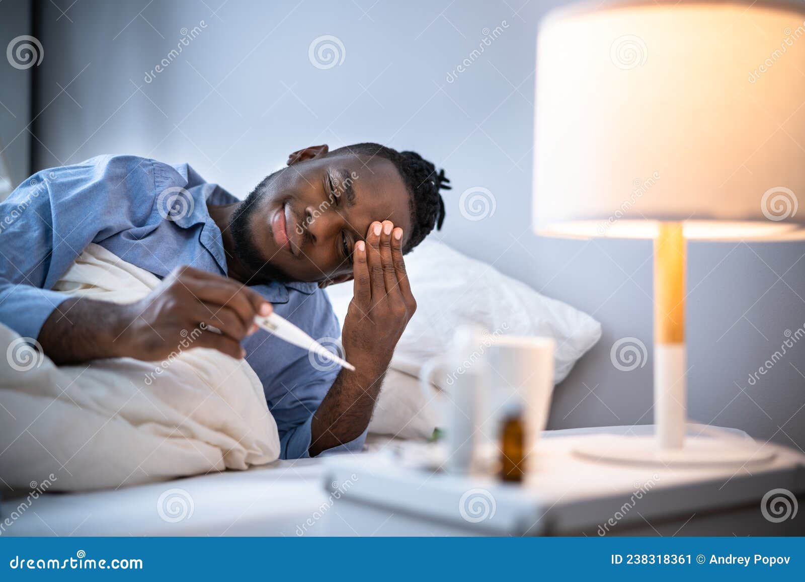 Sick Man with Fever Using Thermometer Stock Image - Image of bedroom ...