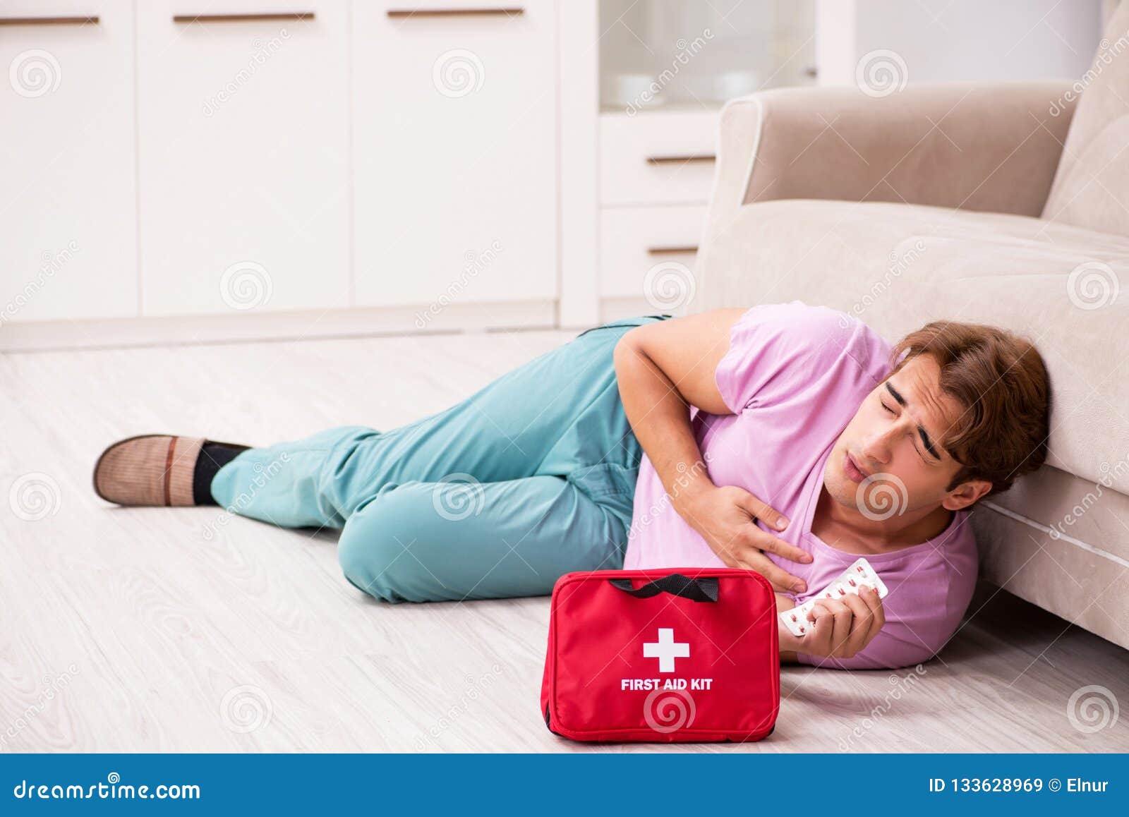 The Sick Man at Home with First Aid Kit Stock Image - Image of cross, patient: 133628969